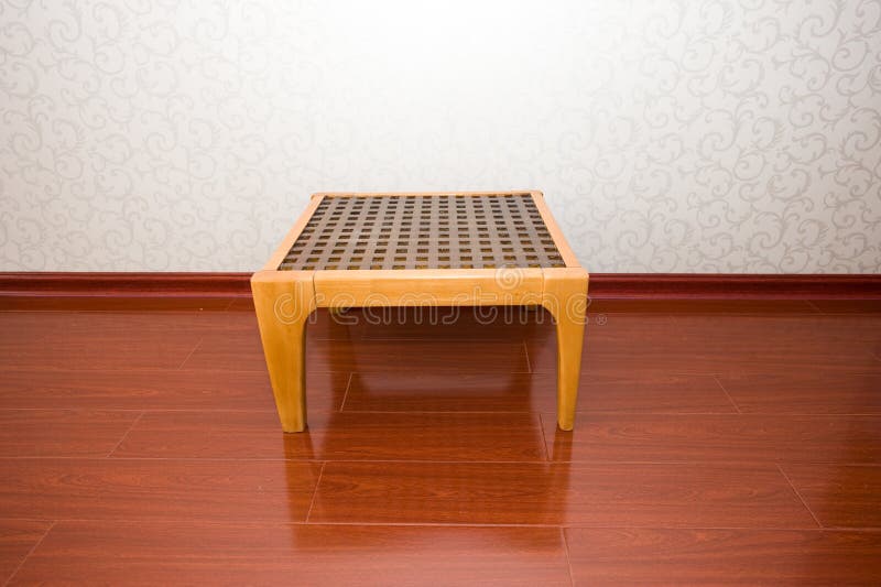 Wooden table on floor stock photo. Image of floor, simplicity - 24933688