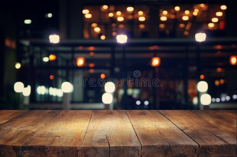 Wooden Table in Front of Abstract Blurred Background of Resturant ...