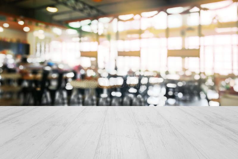 Wooden Table in Front of Blurred Restaurant Lights Background. Stock ...