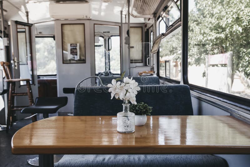 Wooden Table Inside an Old Train Transformed into a Restaurant Stock ...