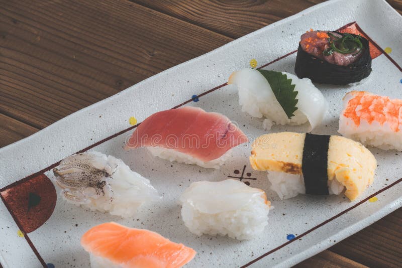 Wooden Table and Japanese Sushi Stock Photo - Image of japan, pottery ...