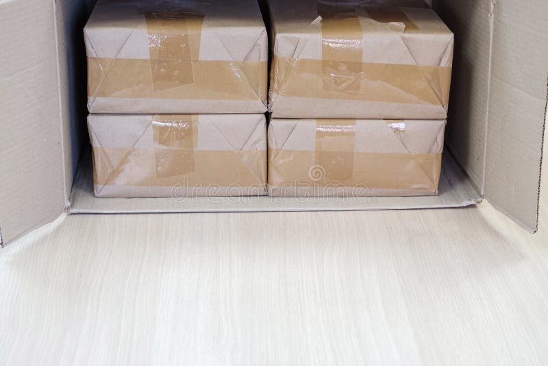 On a Wooden Table in a Paper Box Sealed Packaged Packs Stock Image ...