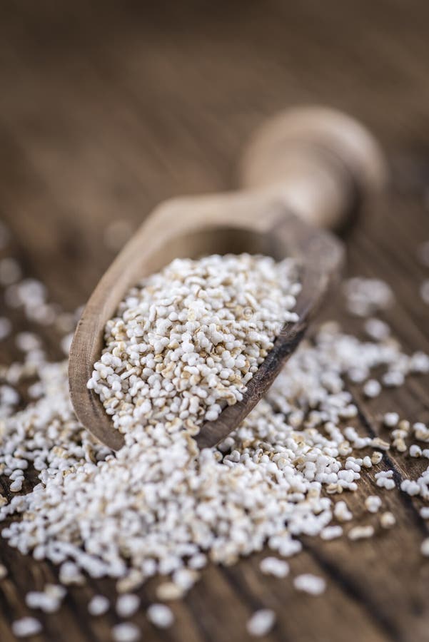 Wooden Table with a Portion of Puffed Amaranth (selective Focus) Stock ...