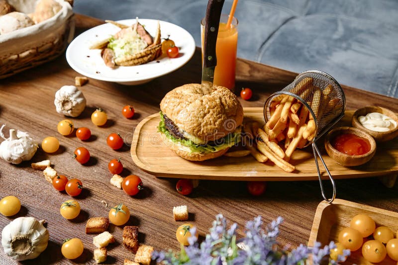 Wooden Table Adorned with Assorted Plates of Food Stock Image - Image ...