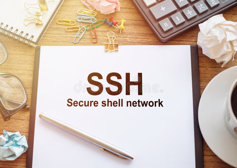 On a Wooden Table There is an Office Sheet of Paper with the Text SSH ...