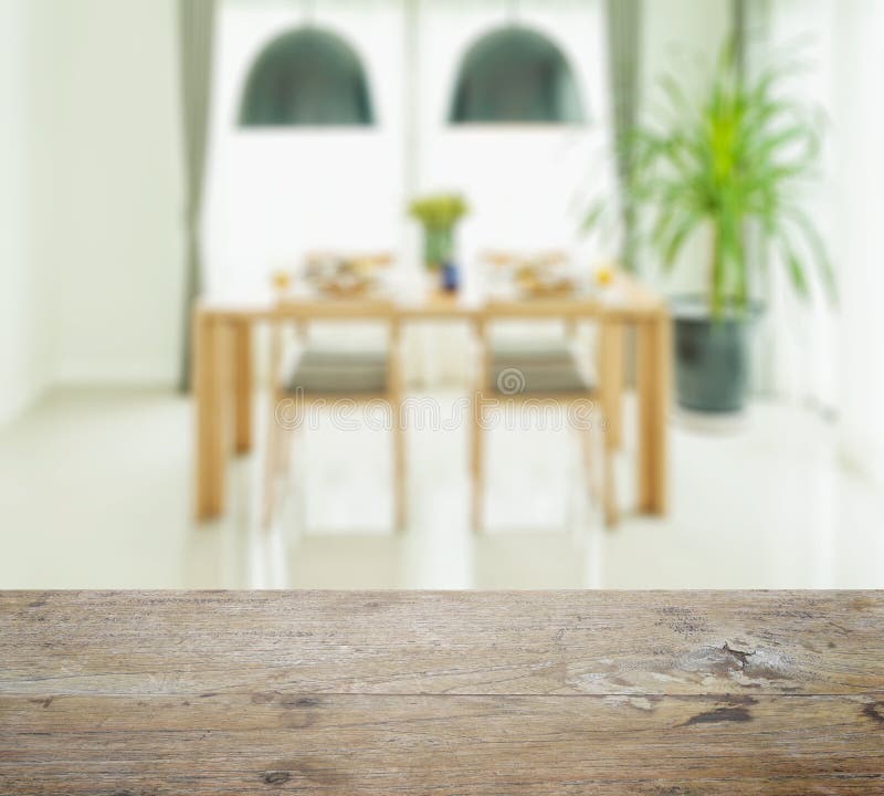 Wooden Table Top with Blur of Dining Table and Chairs Stock Photo ...