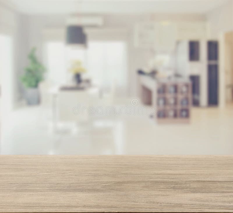 Wooden Table Top with Blur Image of Modern Dining Room Stock Image ...