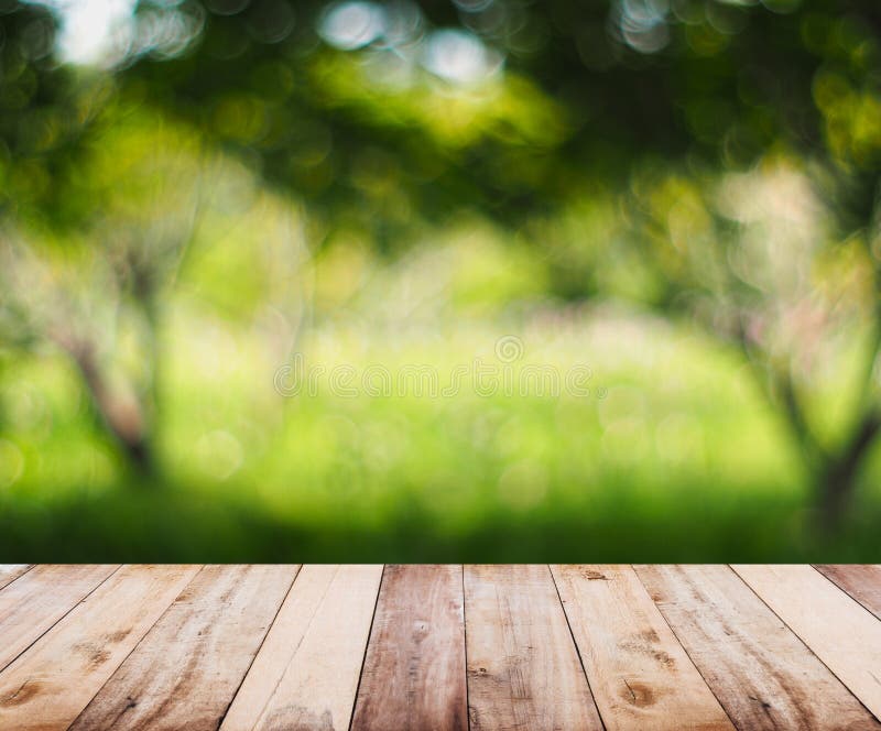 Wooden Table Top Over Abstract Natural Background Stock Photo - Image ...