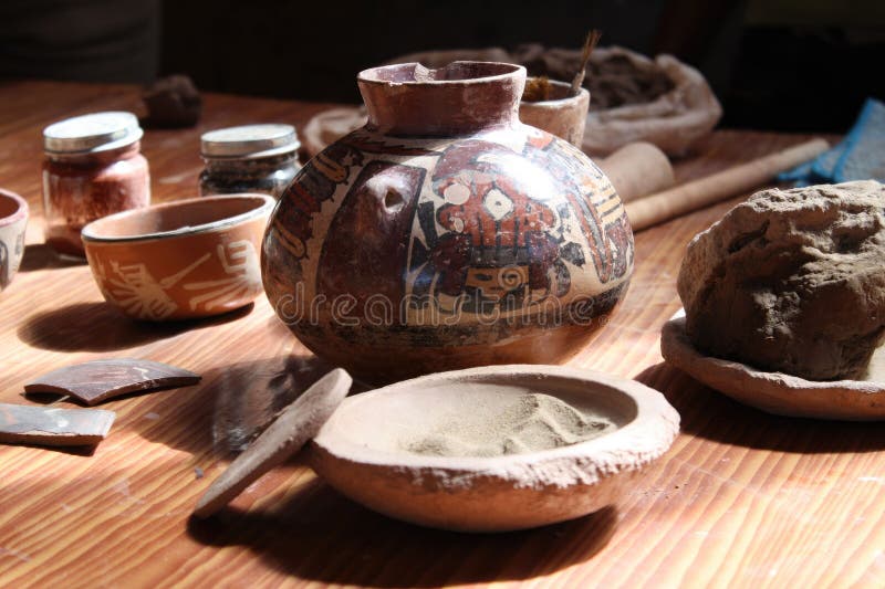 Wooden Table with Traditional Peruvian Pottery Samples. Stock Photo ...