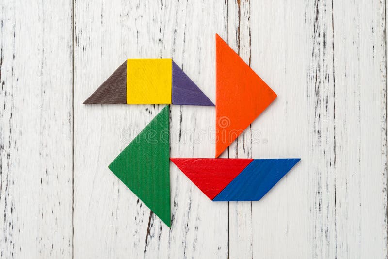Wooden Tangram in Pinwheel Shape Stock Image - Image of construction ...