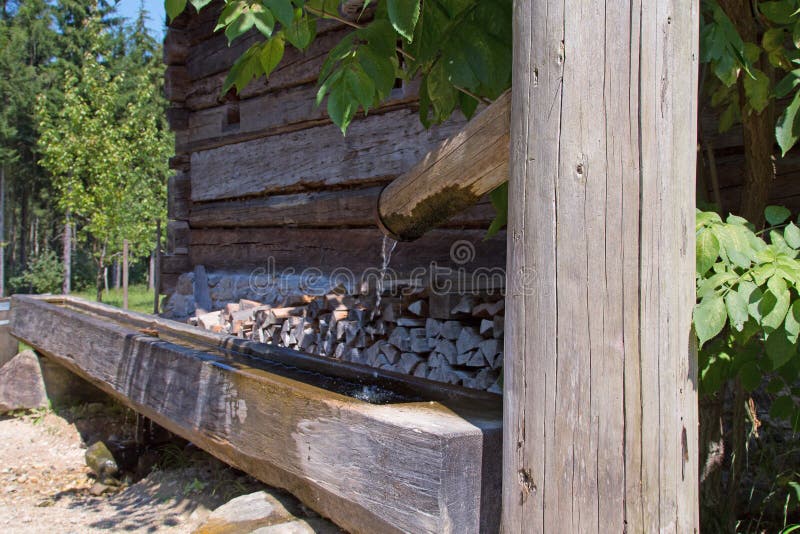 Wooden tap with water stock photo. Image of tree, drinking - 62831064