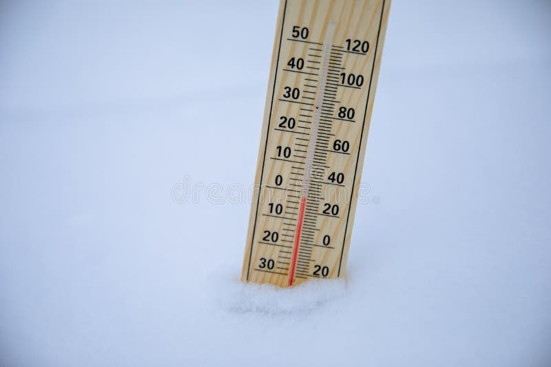 Wooden thermometer in snow stock image. Image of sign - 195071043