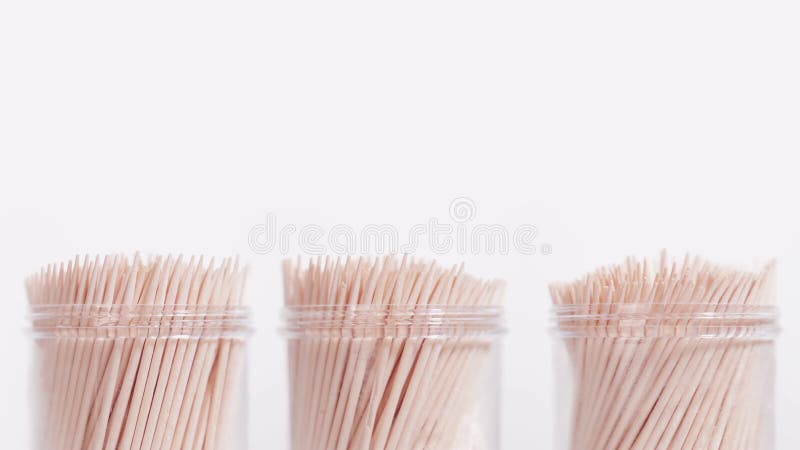 Three Toothpick Containers Rotate on a White Background Stock Footage ...