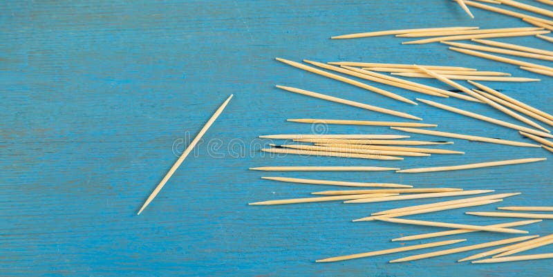 Wooden Toothpicks on the Blue Background Stock Photo - Image of blue ...