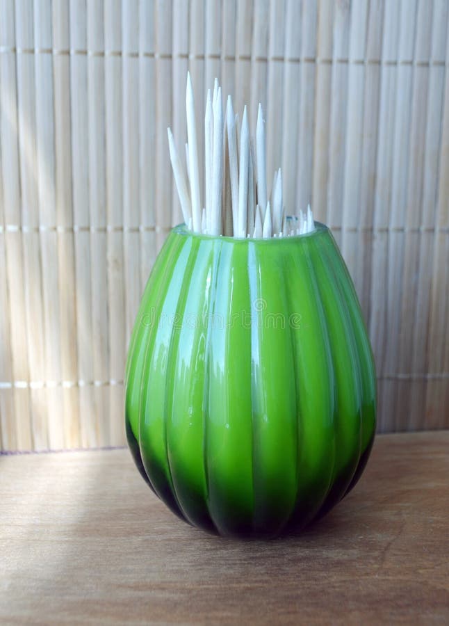 Wooden Toothpicks in the Green Vase Stock Photo - Image of vertical ...