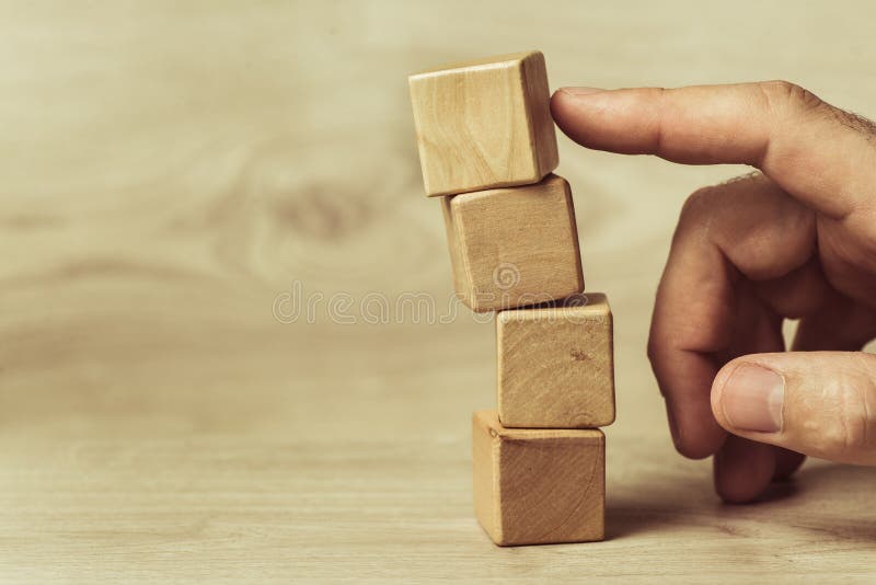 Wooden toy blocks stock photo. Image of finger, crisis - 80085214