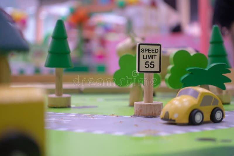 Wooden Toy Car with Speed Limit Sign Stock Image - Image of wooden ...