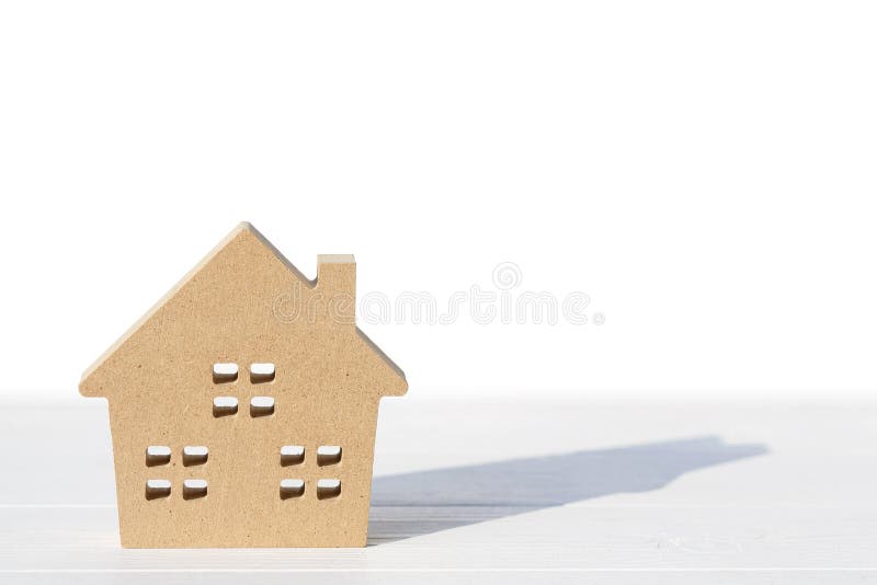 Wooden toy house on table stock image. Image of property - 79962387