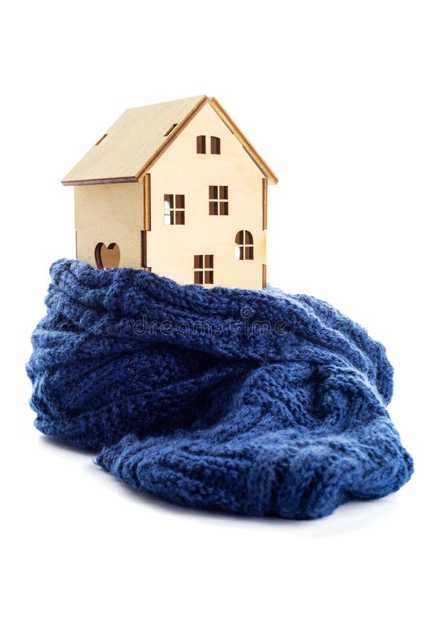 Wooden Toy House is Wrapped in a Warm Scarf Isolated on White ... Wooden Toy House is Wrapped in a Warm Scarf Isolated on White ...