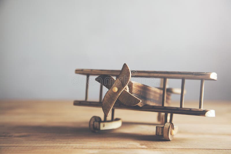 Wooden toy plane on table stock photo. Image of model - 256276348