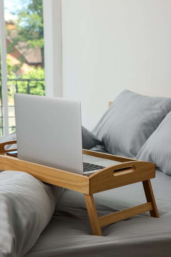 Wooden Tray Table with Laptop on Bed Stock Image - Image of blanket ...
