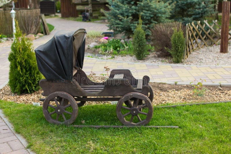Wooden trolley carriage stock photo. Image of grass, chair - 53779498