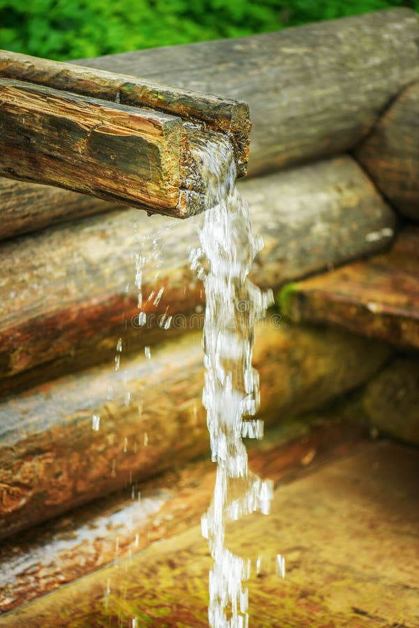 Wooden Trough on Holy Spring Stock Photo - Image of moss, fountain ...