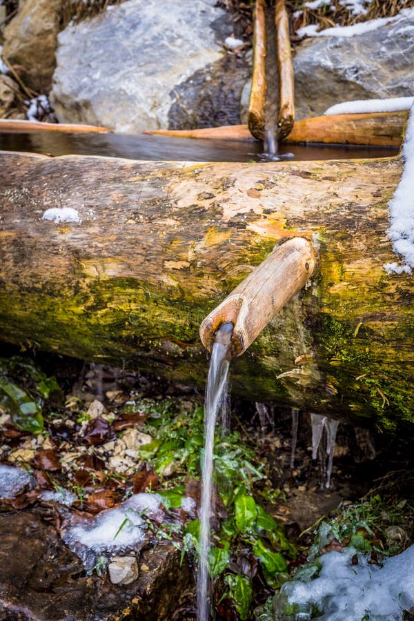Wooden trough water stock image. Image of outdoors, gutter - 48598265