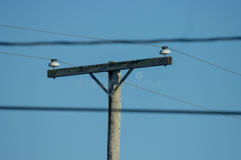 A Wooden Utility Pole and Electrical Lines Stock Photo - Image of ...