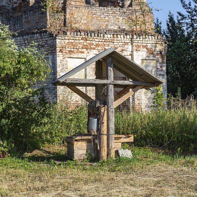 Wooden village well stock image. Image of lawn, nature - 237421797