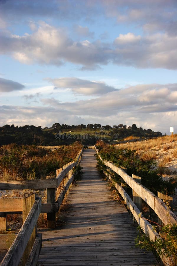 Wooden Walkway from the Beach Stock Image - Image of clouds, horizon ...