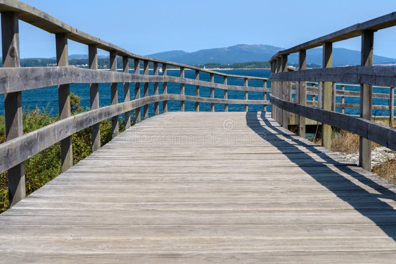 Wooden Walkway with Railings Leading To the Beach Stock Image - Image ...