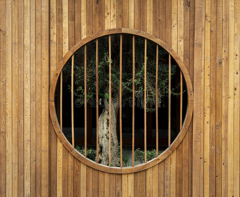 Wooden Wall with a Lattice Round Window Stock Image - Image of lattice ...
