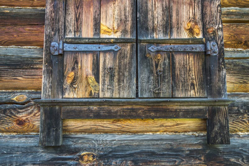 A Wooden Wall with Shuttered Windows Stock Image - Image of housing ...