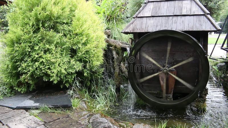 Old Water Mill Still Working. Wooden Wheels of Old Mill are Rotating ...