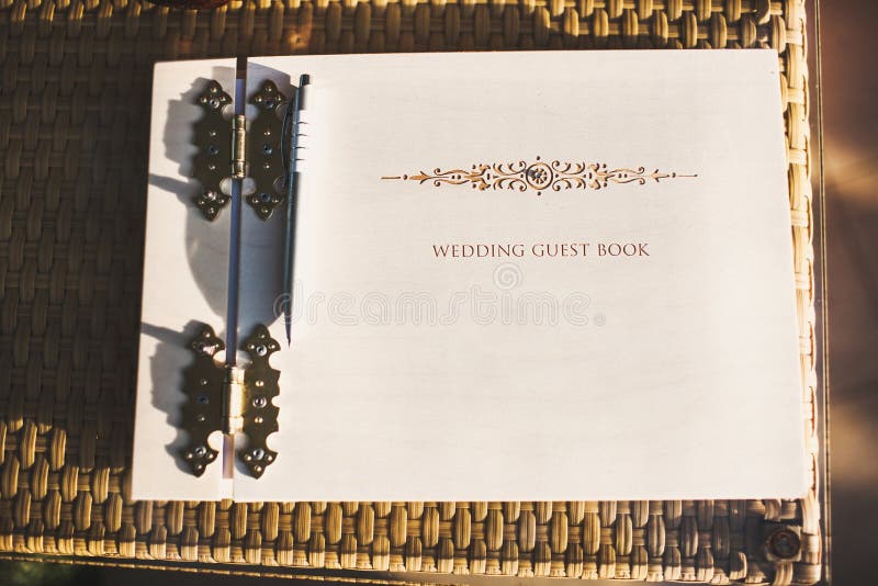 Wooden Wedding Guest Book on a Wicker Table Stock Image - Image of ...