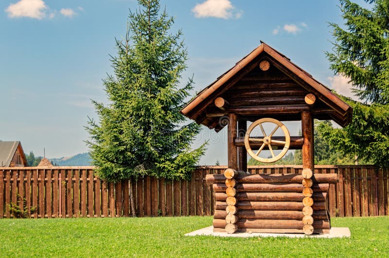 Wooden Well House stock photo. Image of grass, fence - 61669718