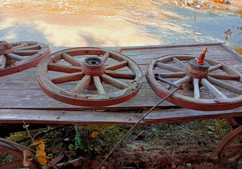 Wooden Wheels Resting on an Old Wooden Cart Stock Photo - Image of ...