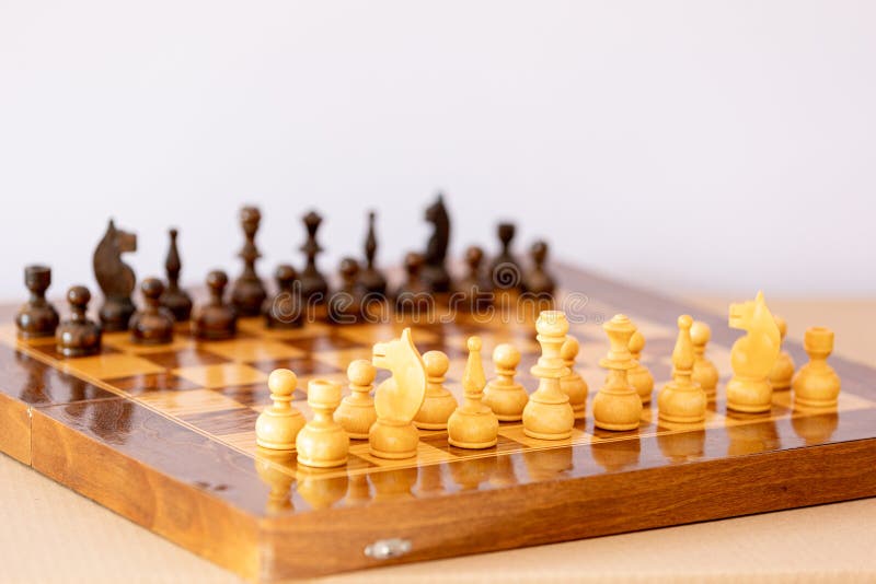Wooden White Chess Pieces on the Chessboard Stock Photo - Image of ...