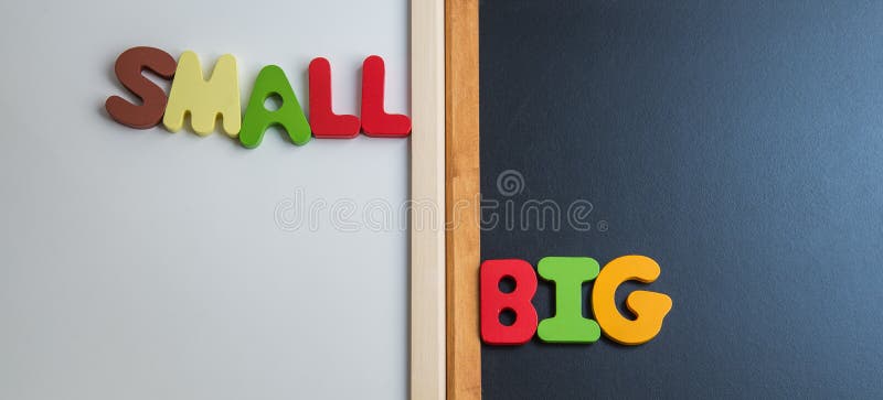 Wooden Word SMALL and BIG on Black Board and White Board Stock Image ...
