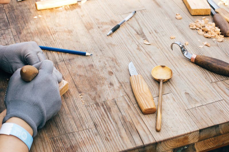 Wooden Workshop. Hands Carving Spoon from Wood, Working with Chisel ...