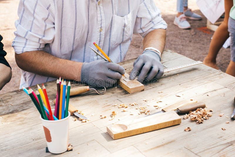 Wooden Workshop. Hands Carving Spoon from Wood, Working with Chisel ...