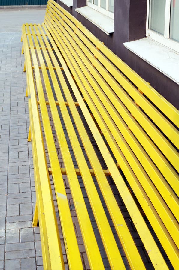 Wooden Yellow Bench in the City Stock Image - Image of construction ...