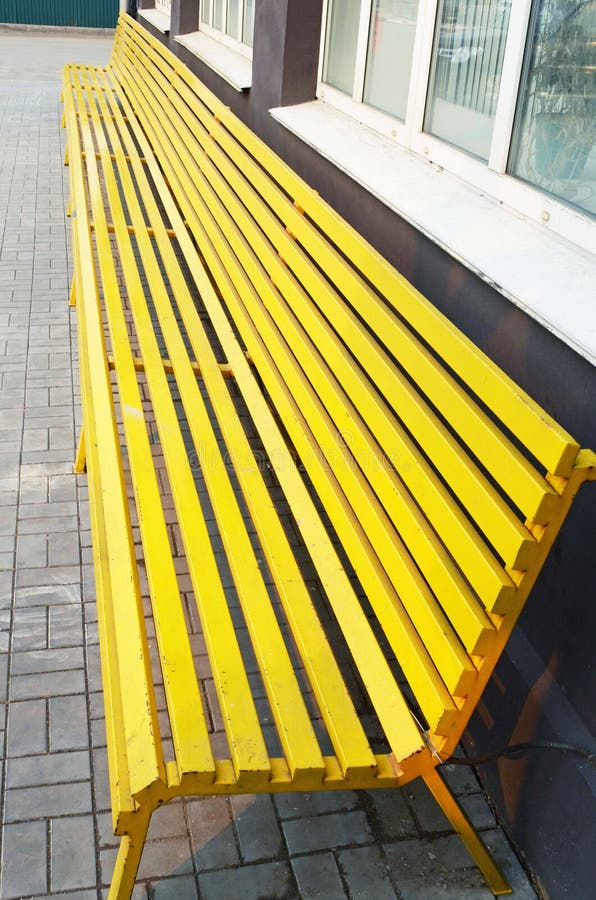 Wooden Yellow Bench in the City Stock Photo - Image of background ...