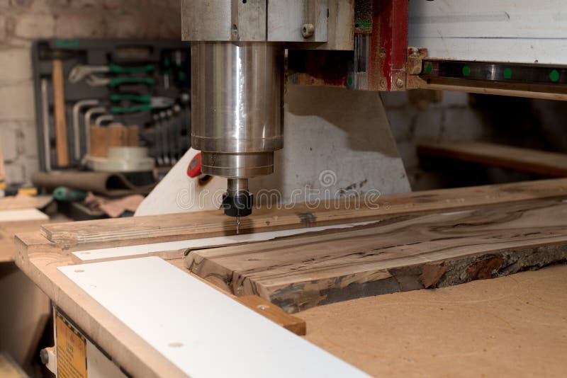 Woodwork Cnc Machine Working on Wood Board. Tool at the Wood Factory ...