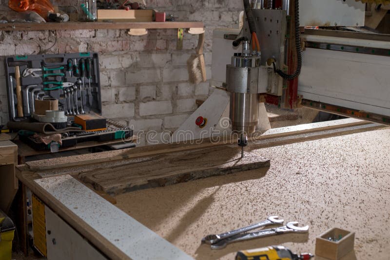 Woodwork Cnc Machine Working on Wood Board. Tool at the Wood Factory ...