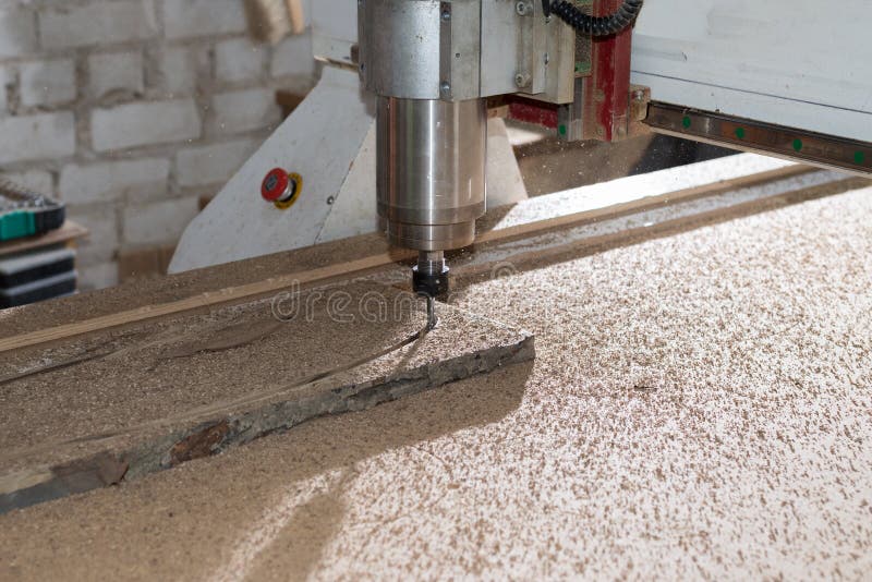 Woodwork Cnc Machine Working on Wood Board. Tool at the Wood Factory ...