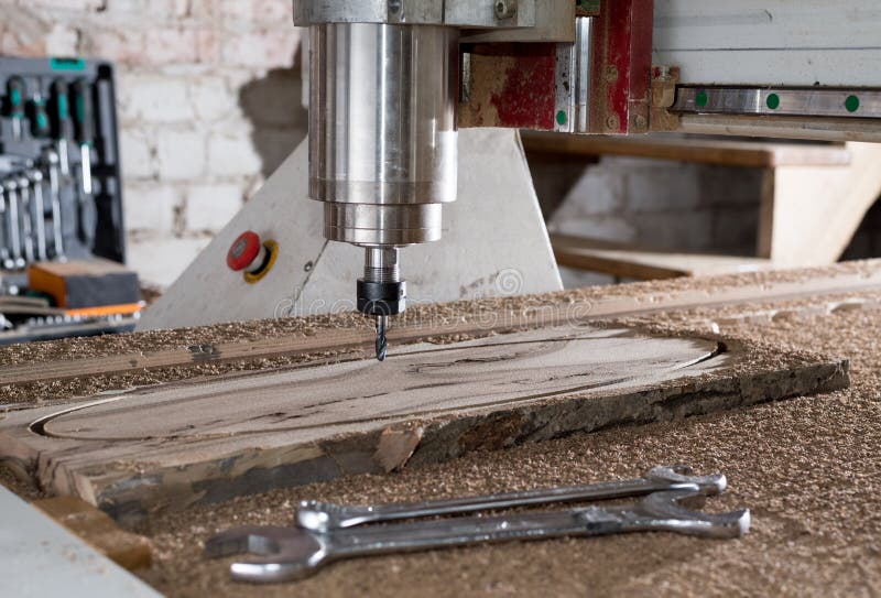 Woodwork Cnc Machine Working on Wood Board. Tool at the Wood Factory ...
