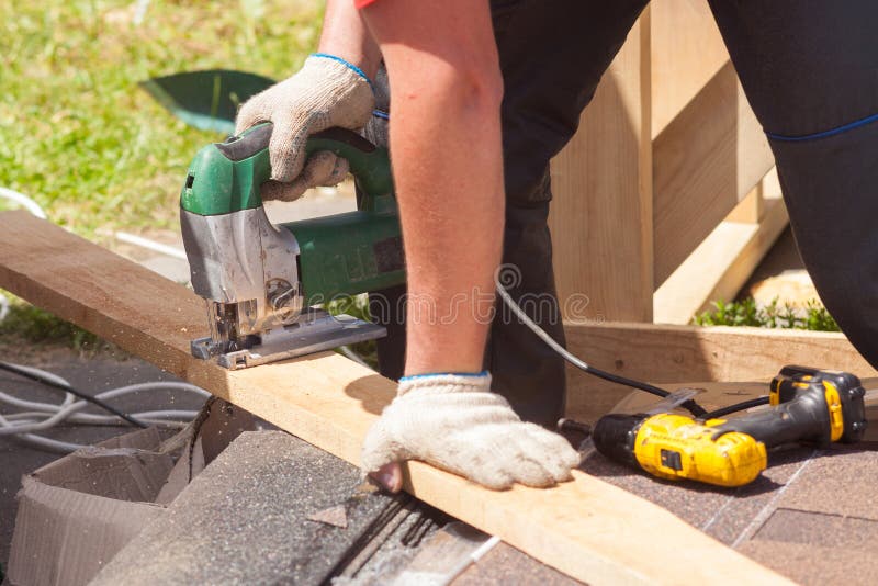 A Woodworker Cutting a Board Stock Image - Image of thirties, bandsaw ...