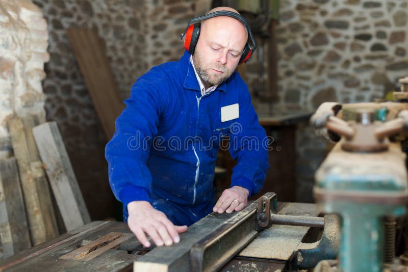 Woodworker on Lathe in Workroom Stock Photo - Image of hold, craftsman ...